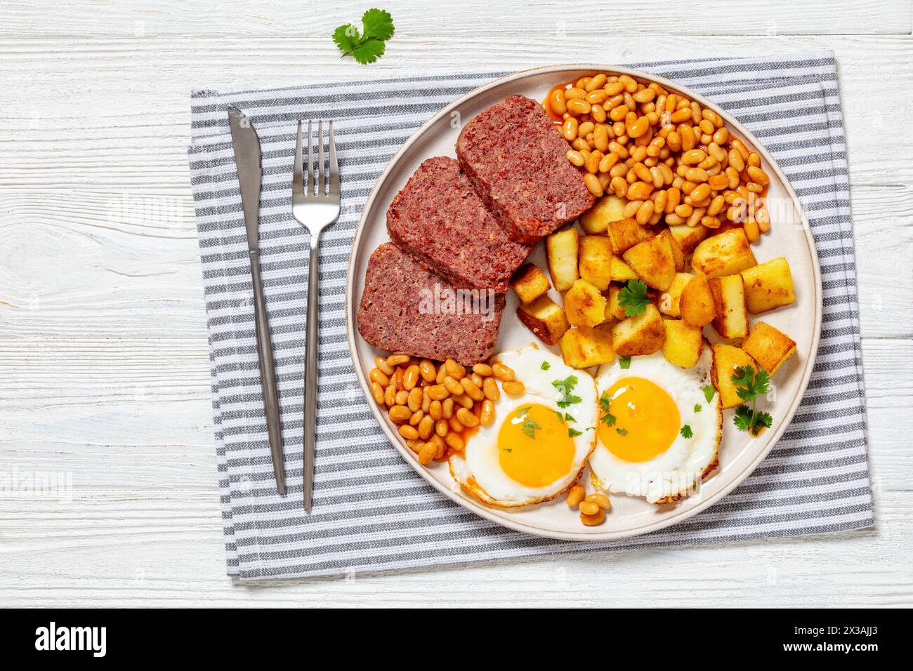corned beef slices, baked beans, roasted potatoes and sunny side up ...