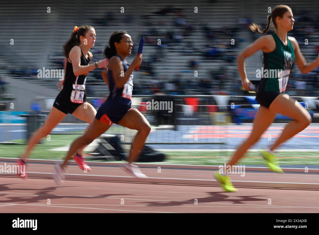 Athletes compete in the 4x400m event of the first day of the 128th Penn ...