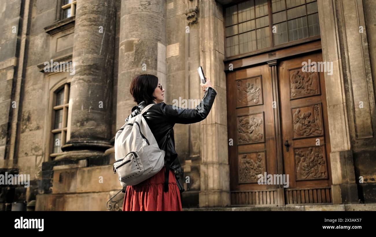 Attractive Female Tourist Walks With Germany Flag In Dresden'S ...