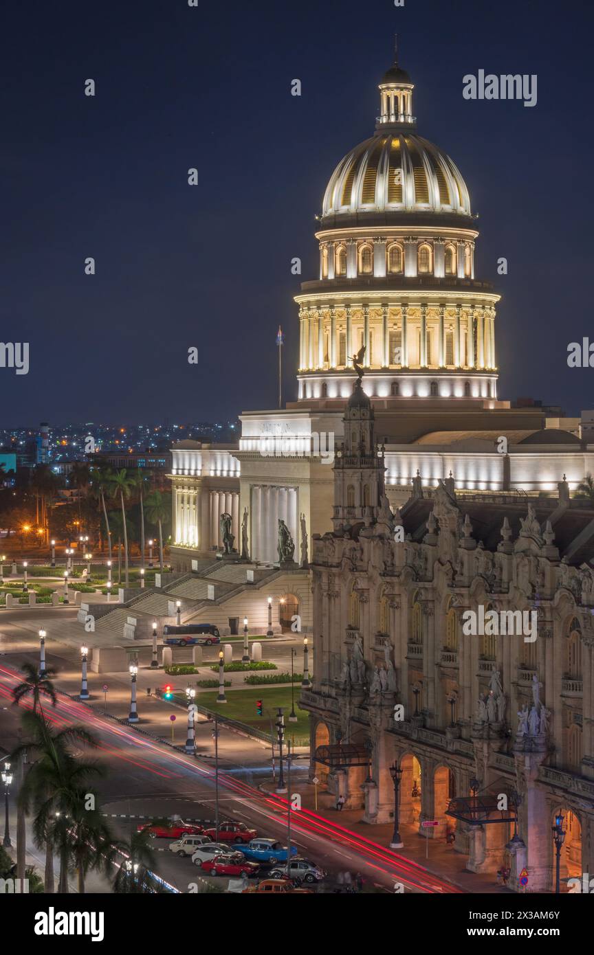 A night time view across Central park, Havana, Cuba, showing the mix of ...