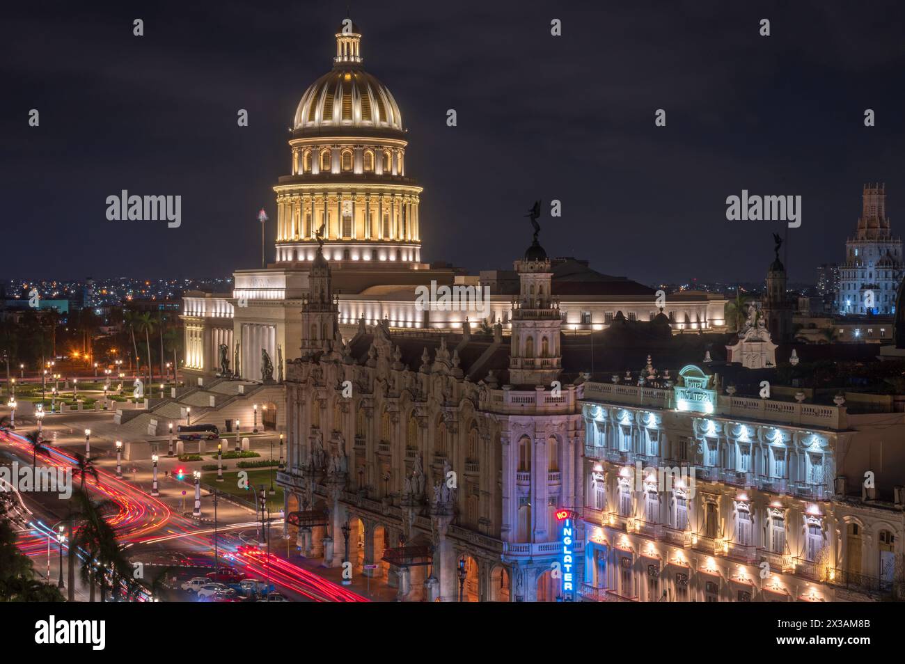 A night time view across Central park, Havana, Cuba, showing the mix of ...