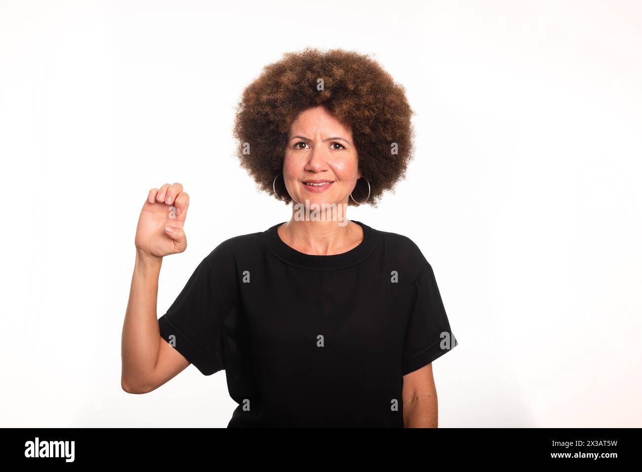 Female interpreter of the Brazilian sign language, Libras, making the ...