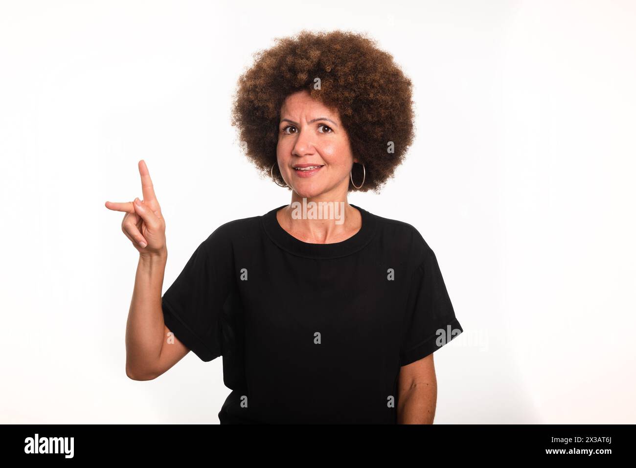 Female interpreter of the Brazilian sign language, Libras, making the ...