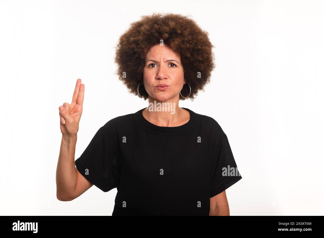 Female interpreter of the Brazilian sign language, Libras, making the ...