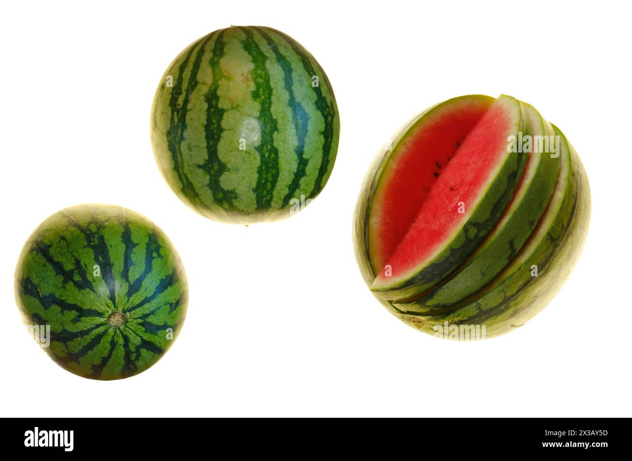 Whole watermelons and cut watermelon isolated on a white background ...