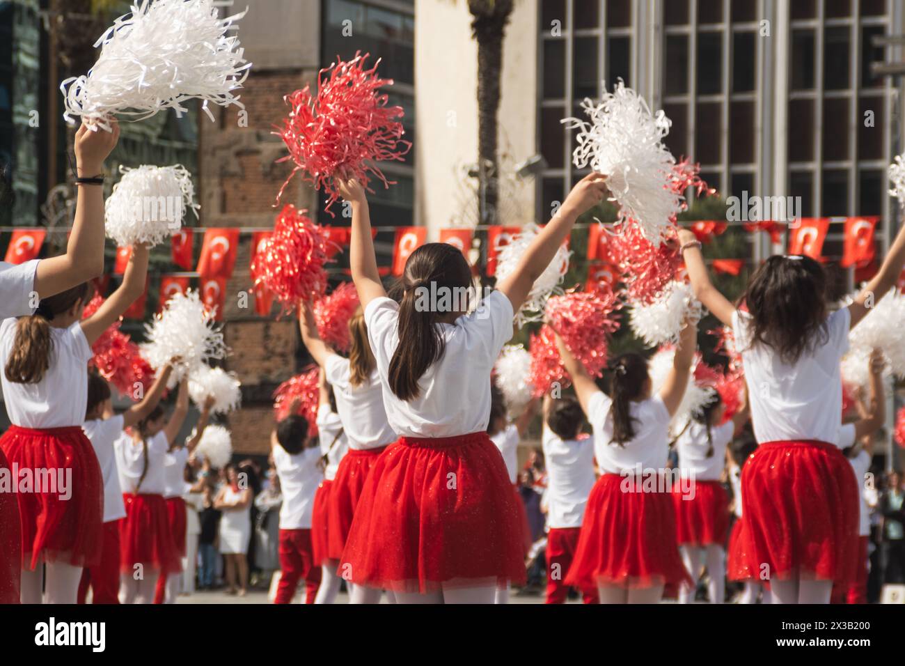 Izmir, Turkey - April 23, 2024: Children adorned in red and white ...