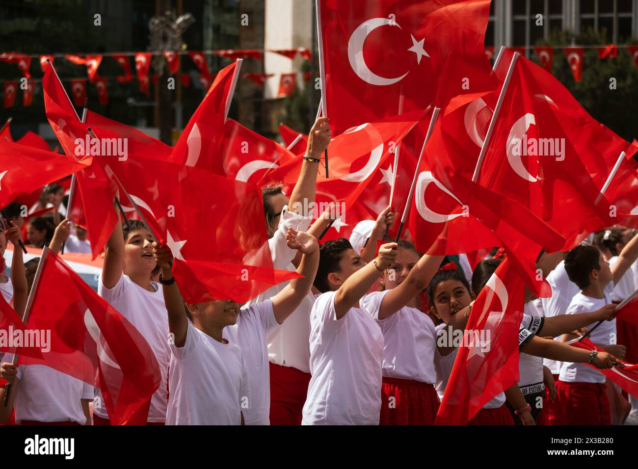 Izmir, Turkey - April 23, 2024: Enthusiastic Turkish students wave ...