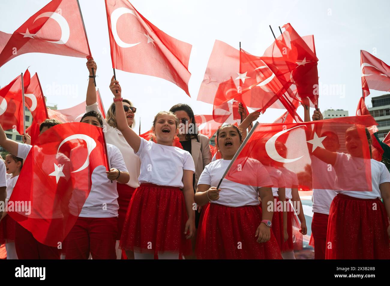 Izmir, Turkey - April 23, 2024: Enthusiastic Turkish students wave ...