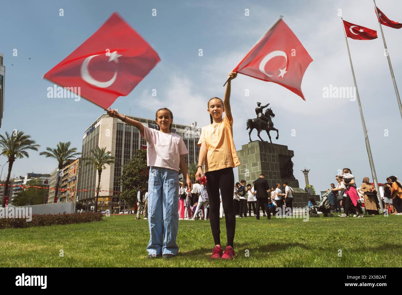 Izmir, Turkey - April 23, 2024: Jubilant girls wave flags at Children's ...
