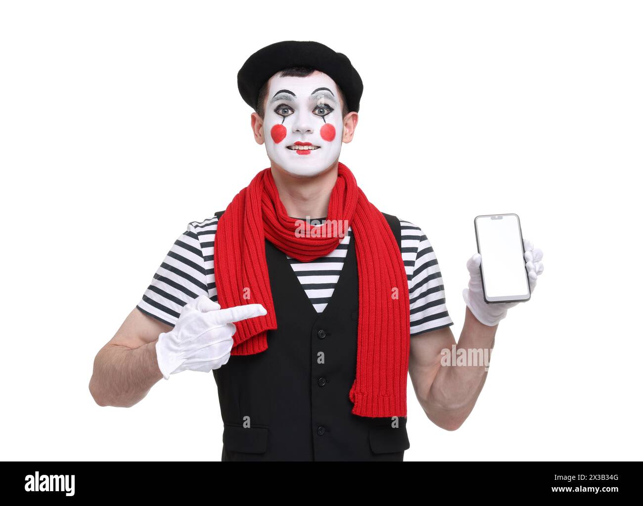 Funny mime artist pointing at smartphone on white background Stock ...