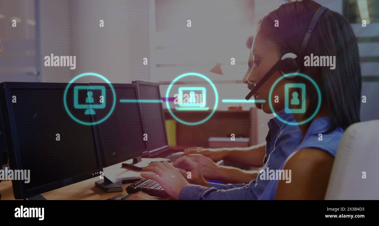 Image of technological icons over multi-ethnic group of people working ...