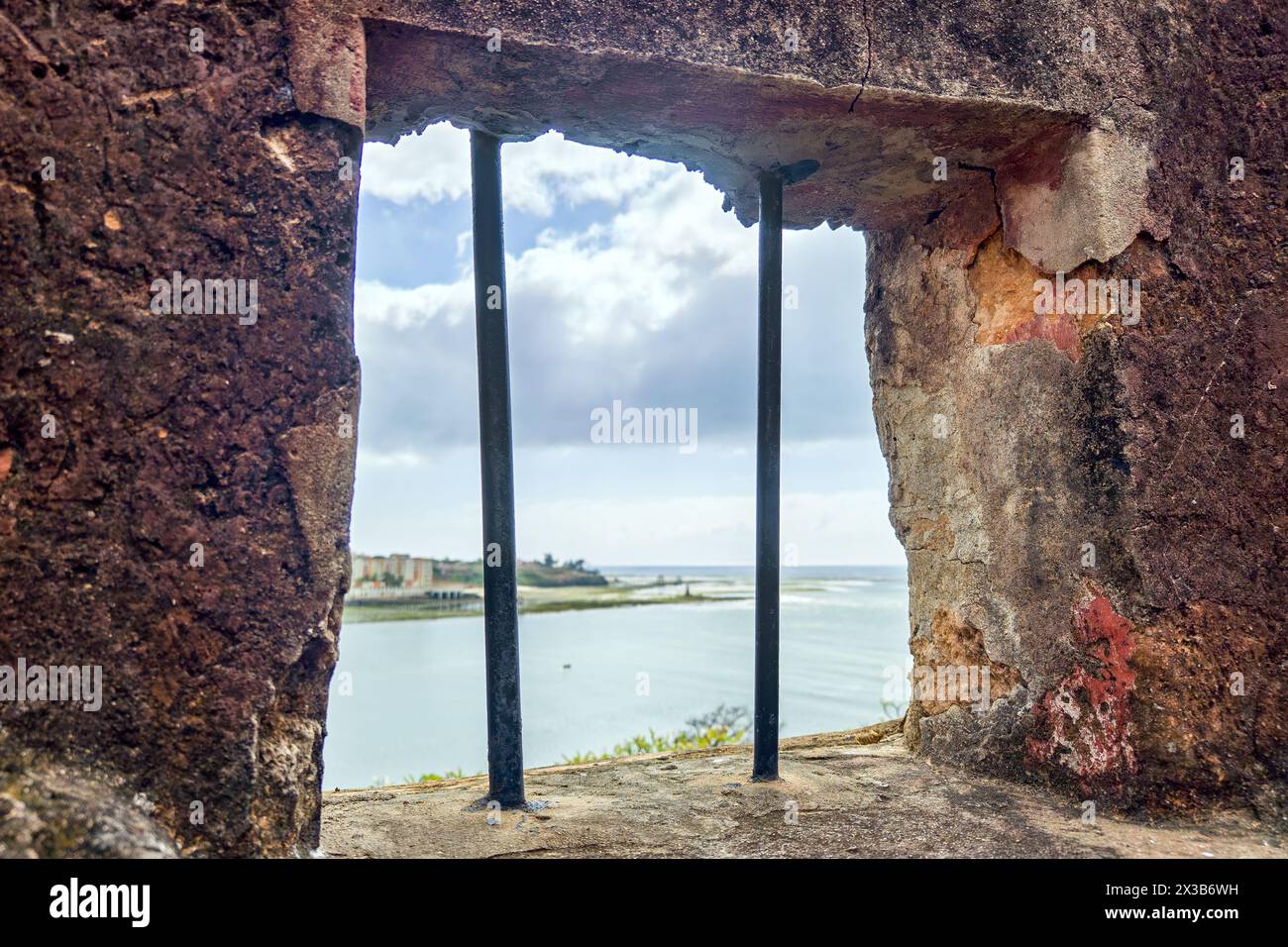 the facade of an old building with windows and doors. Fort Jesus is a ...
