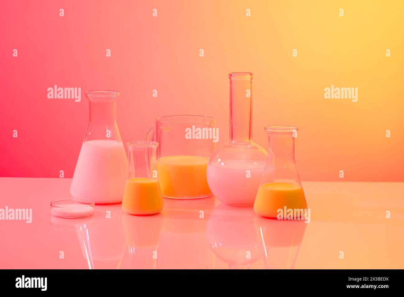 A flat-bottom florence flask, petri dish, a mug and conical flasks of ...