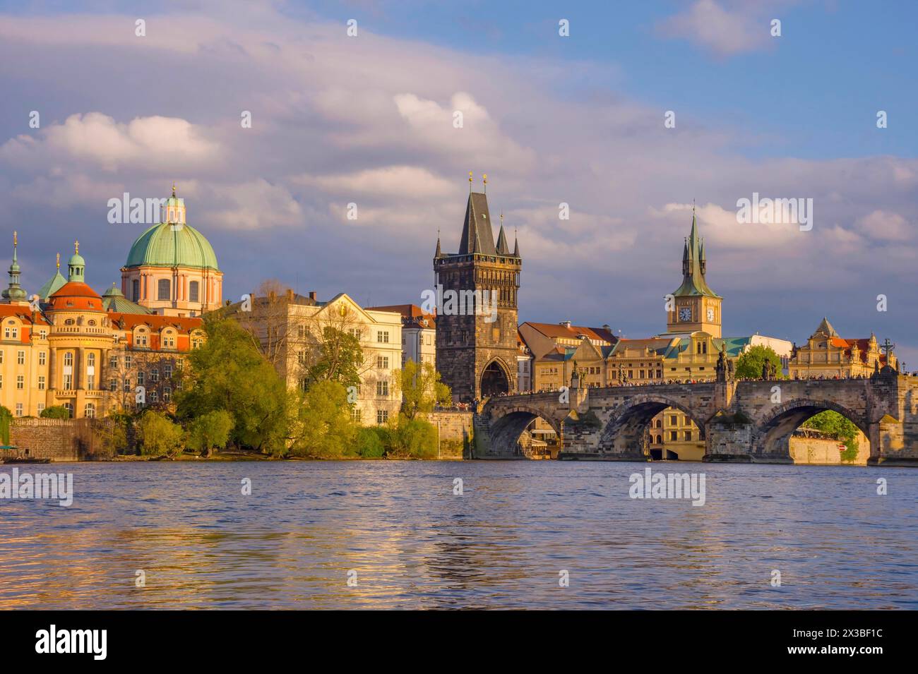 Charles Bridge (Karluv Most) on Vltava river and Old Town Bridge Tower, famous tourist ...
