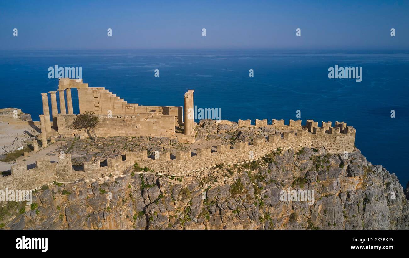 Drone shot, Acropolis of Lindos, Late afternoon light, Temple of Athena ...