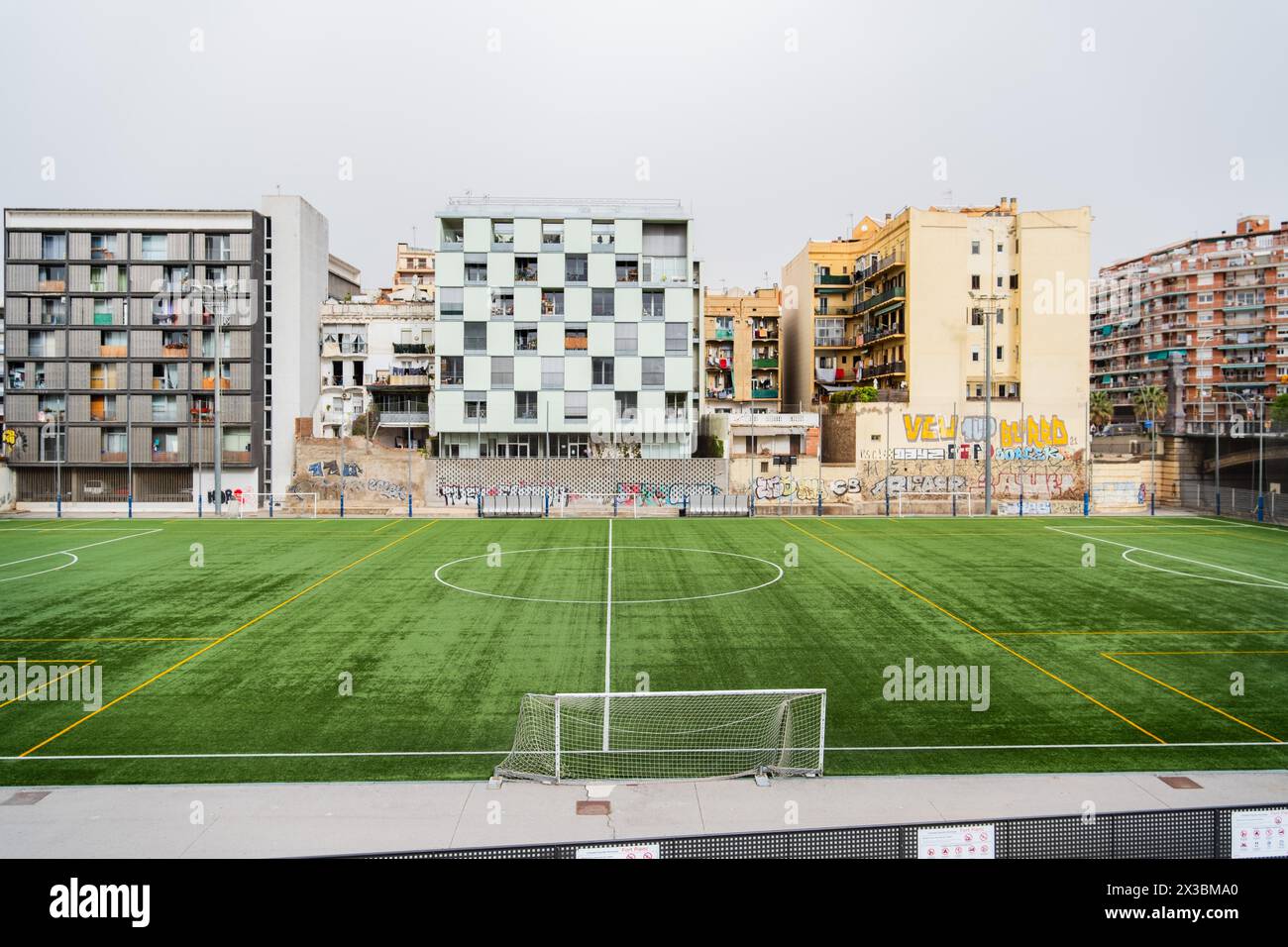Football pitch in the centre of Barcelona, surrounded by multi-storey ...