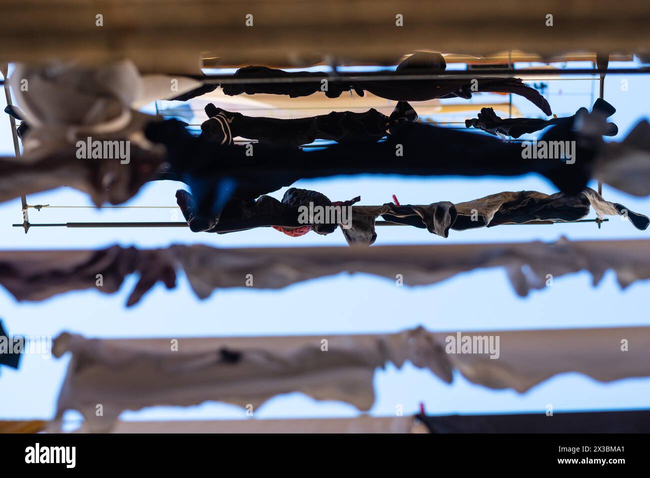 Laundry drying on washing lines at a house in Barcelona, Spain Stock ...