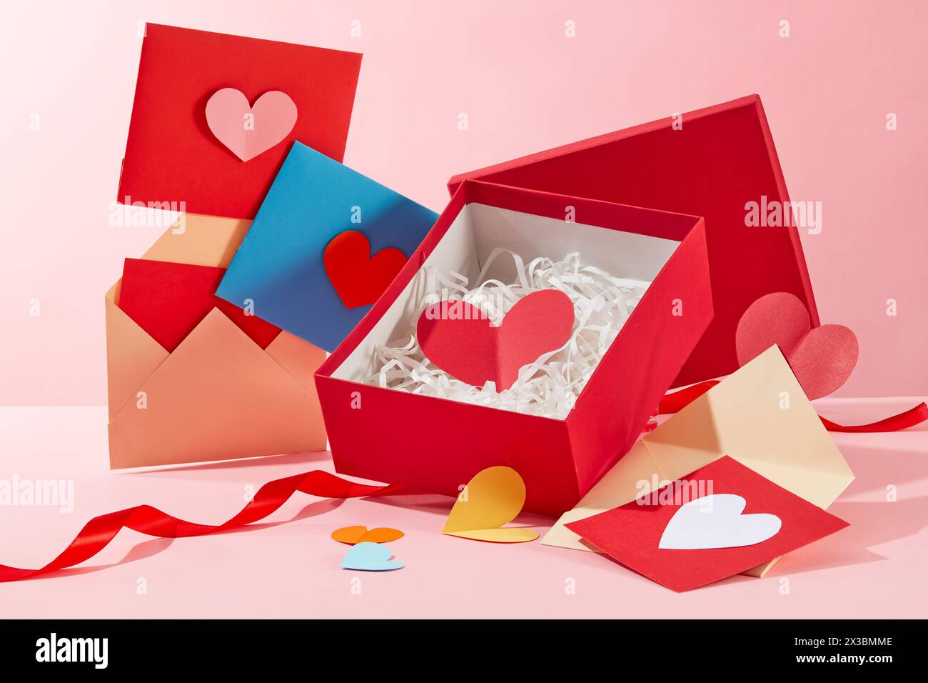 Colorful handmade cards decorated with a gift box in red color. Paper ...