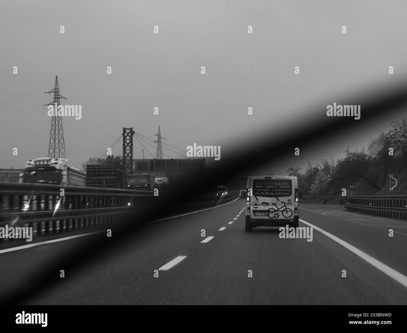 Monochrome scene from inside a car showing a busy highway through the ...