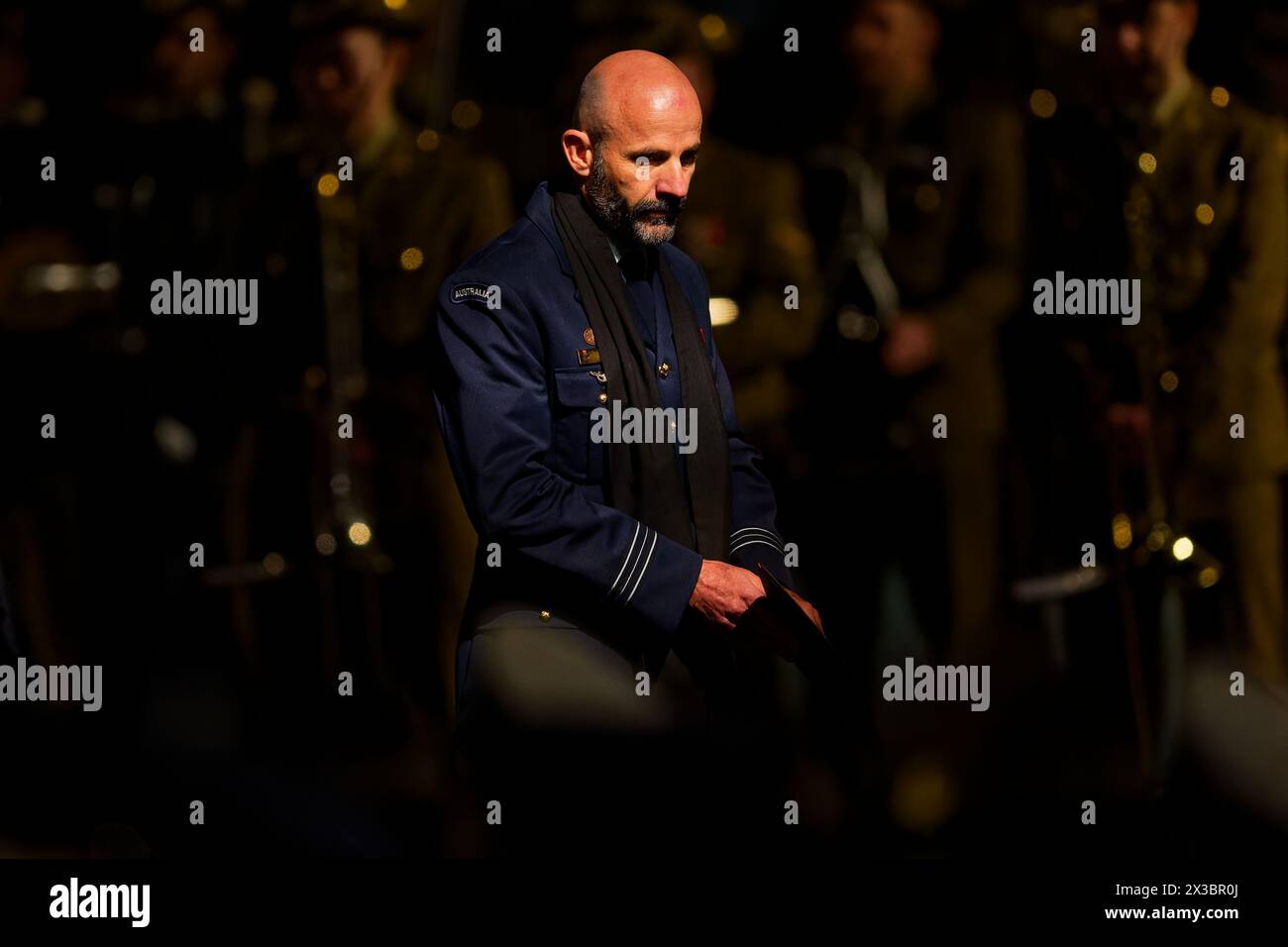 Chaplain Daniel Big walks back to his seat during the ANZAC Day Dawn ...