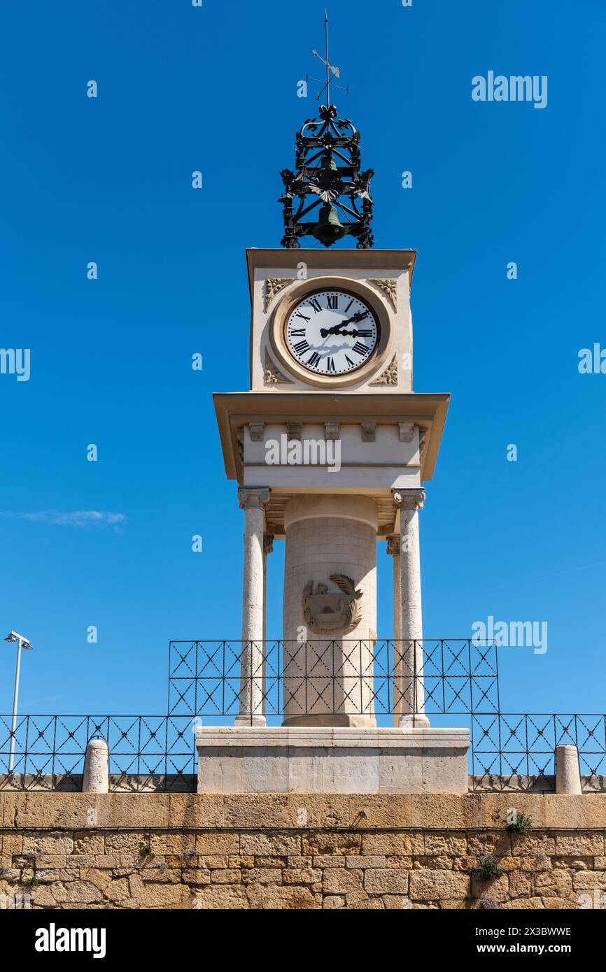 Old clock in the harbour of Tarragona, Spain Stock Photo - Alamy
