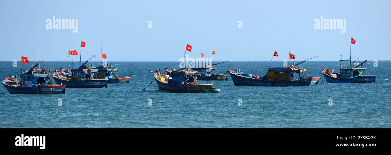 Fishing boats by the Man Thai beach in Da Nang, Vietnam Stock Photo - Alamy