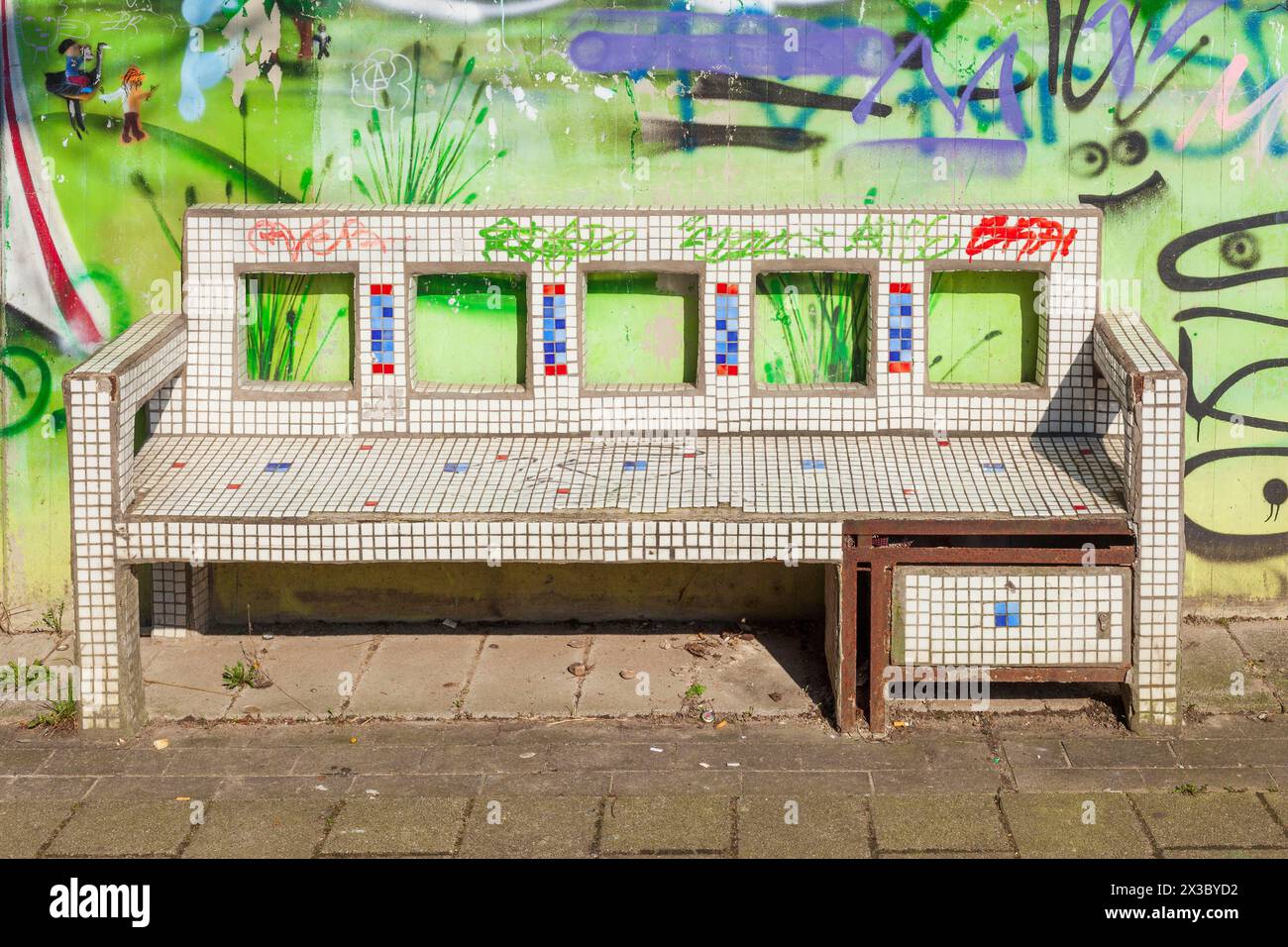 Tiled bench in front of a colourfully painted wall, Germany Stock Photo ...
