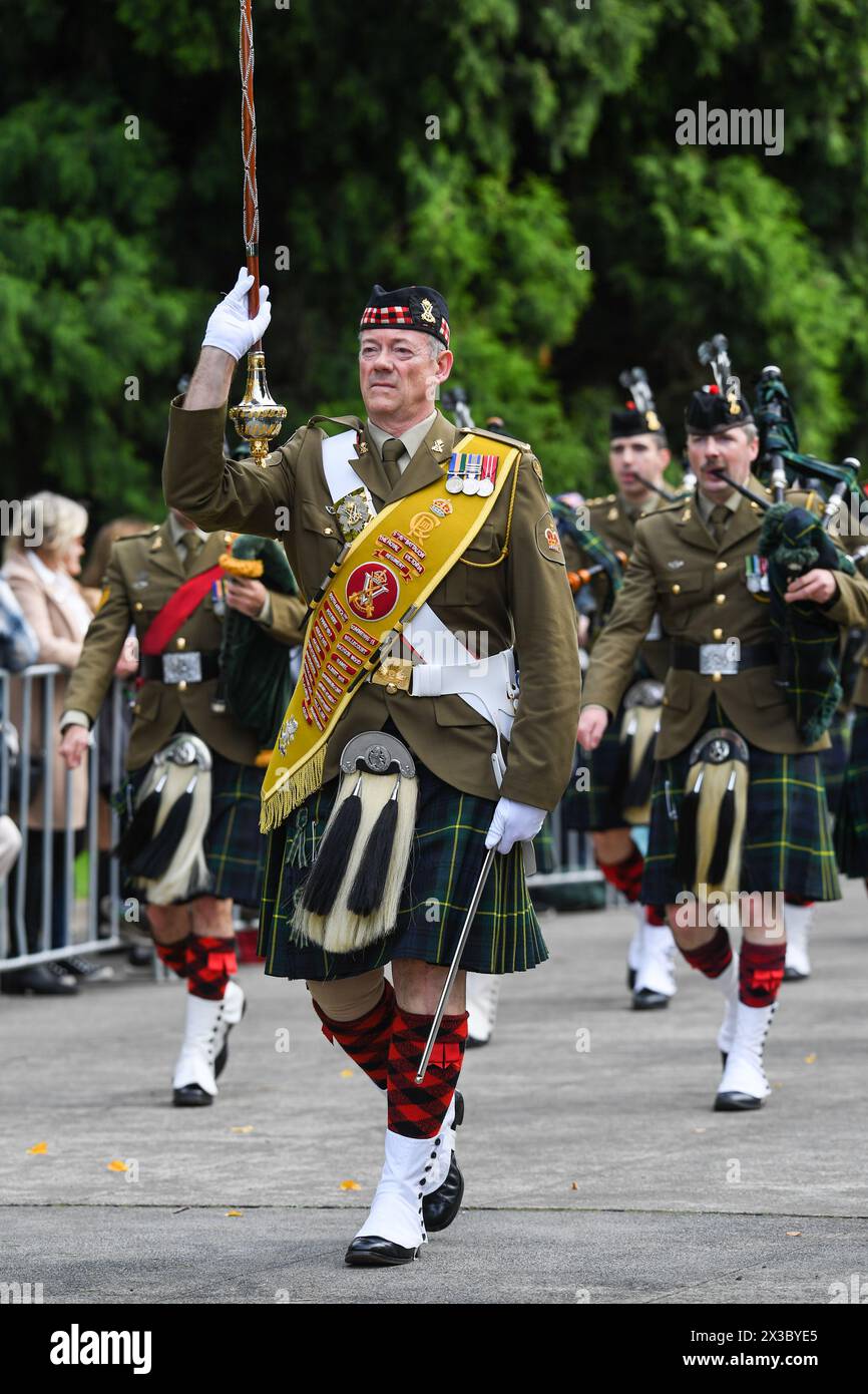 Melbourne, Australia. 25th Apr, 2024. Marching leader with a mace ...