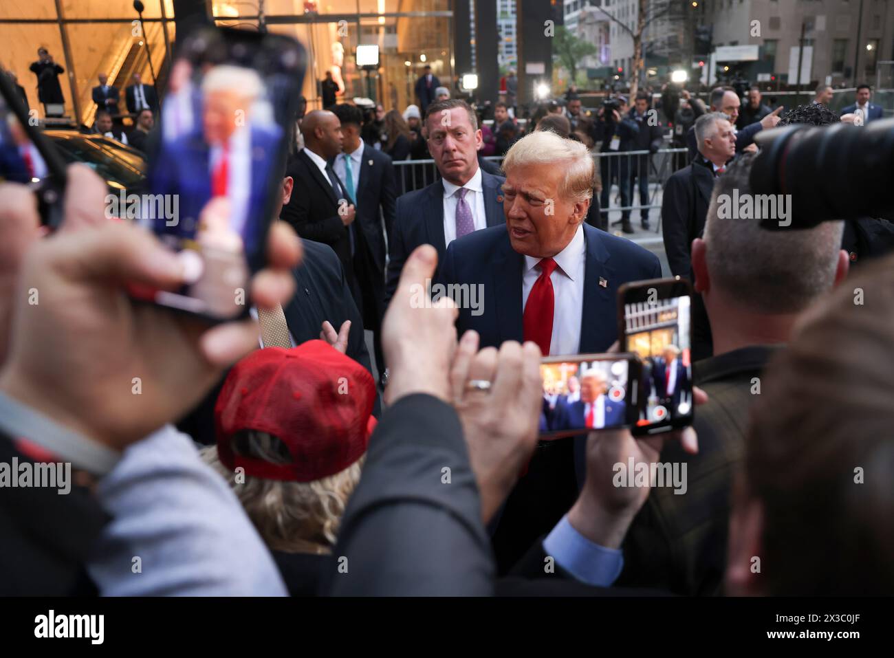 FILE - Former President Donald Trump speaks with construction workers ...