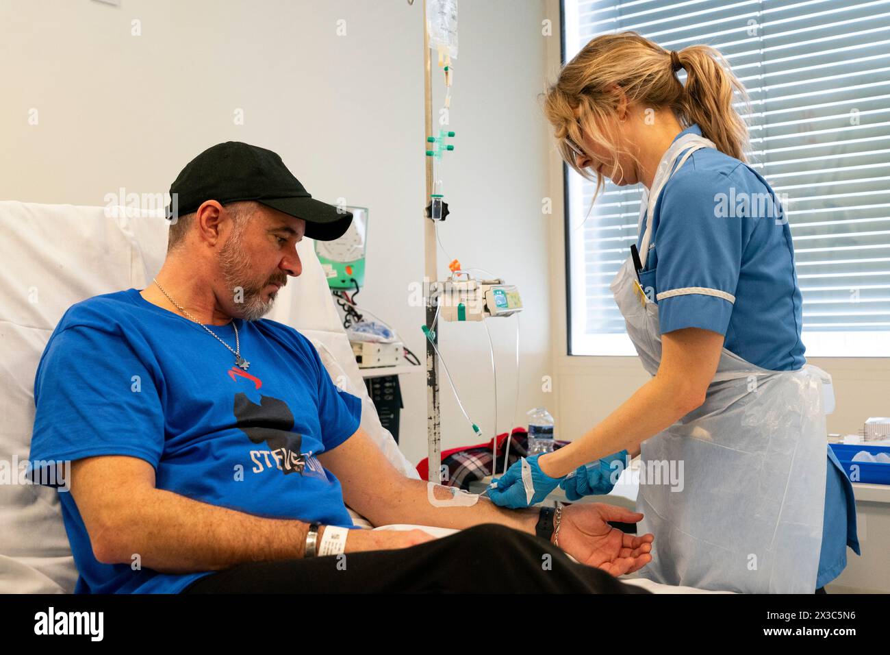 Patient Steve Young is administered infusion by nurse Eleanor Ferguson ...