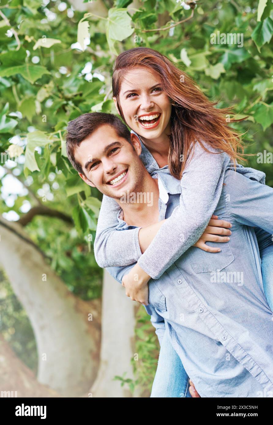 Woman riding piggyback on back hi-res stock photography and images - Alamy