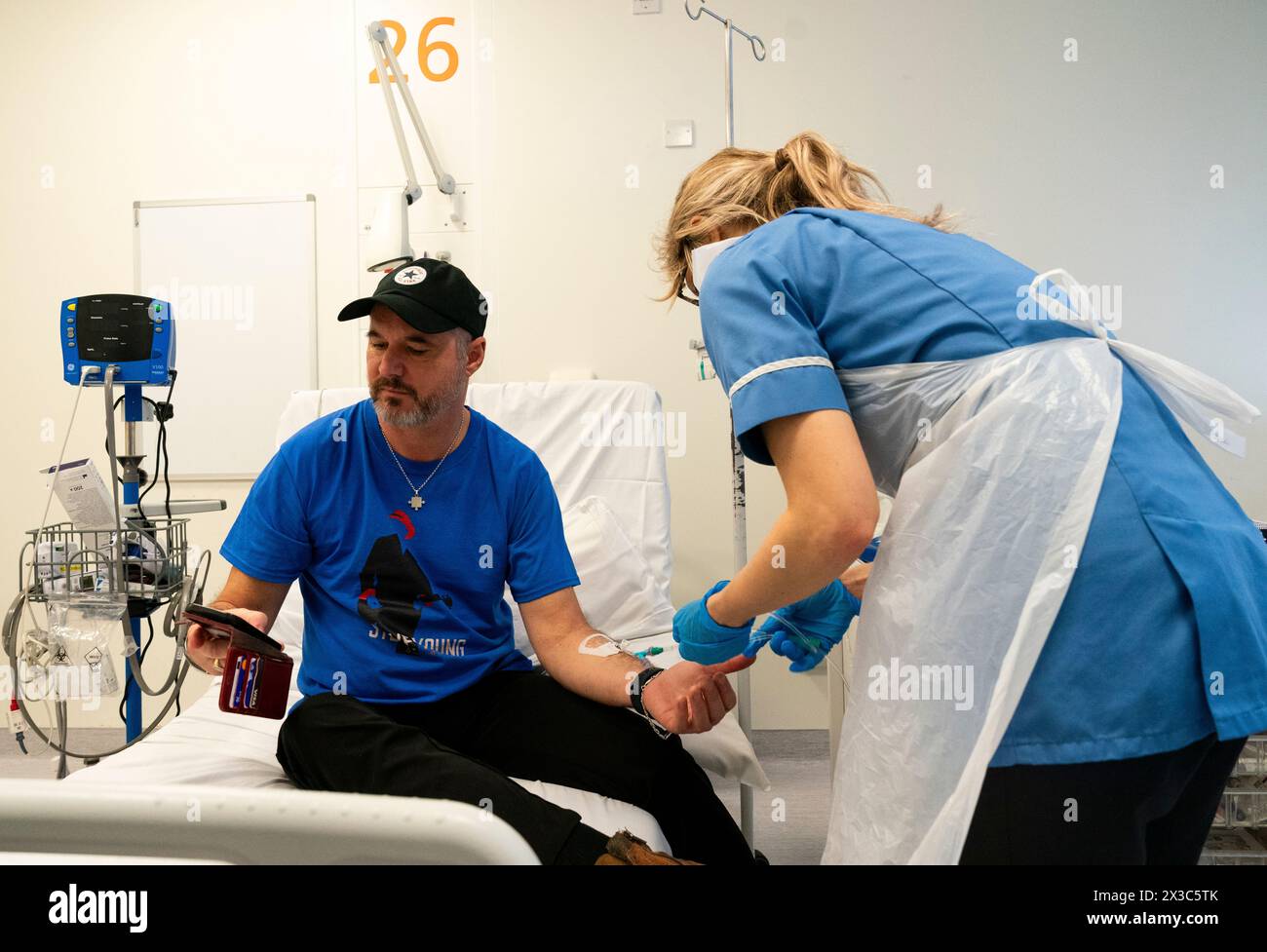 Nurse Eleanor Ferguson after administering infusion to patient Steve ...