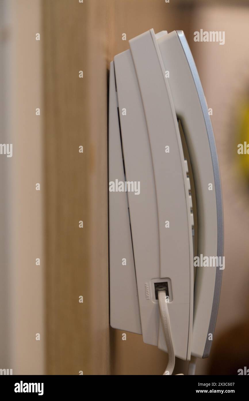 Wall-mounted telephone for calling service personnel. Close-up Stock ... Wall-mounted telephone for calling service personnel. Close-up Stock ...