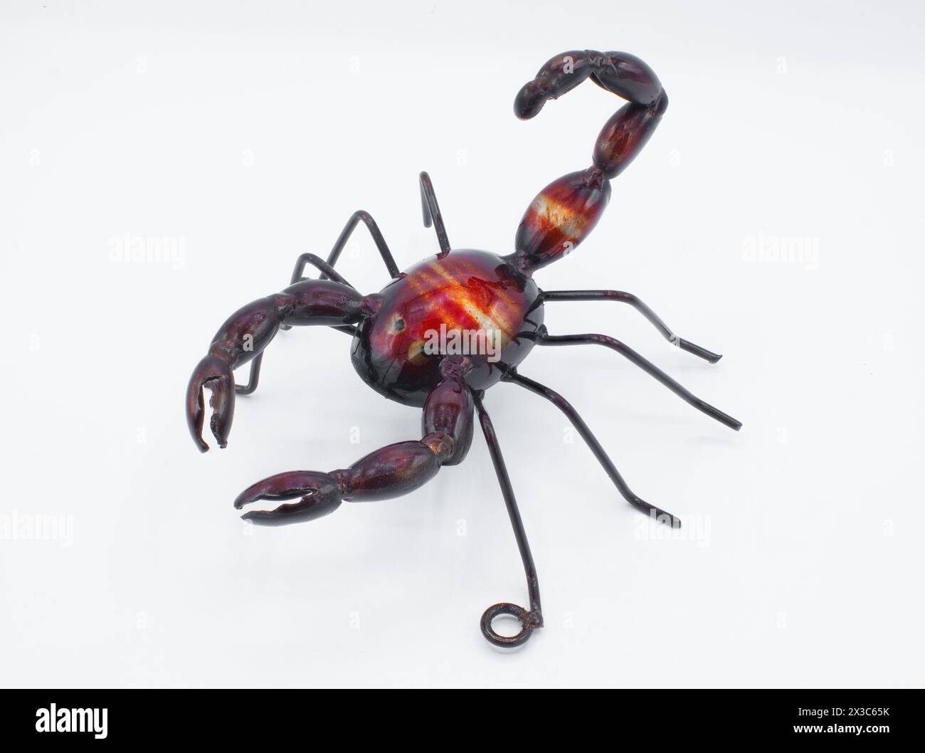 Metal wall art of a scorpion arachnid, red, purple deep brown color ...