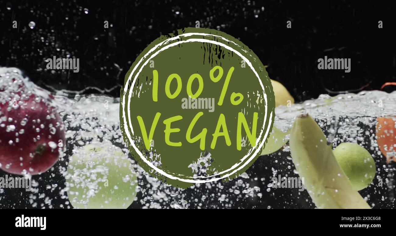 Image of 100 percent vegan text over fruit falling in water background ...