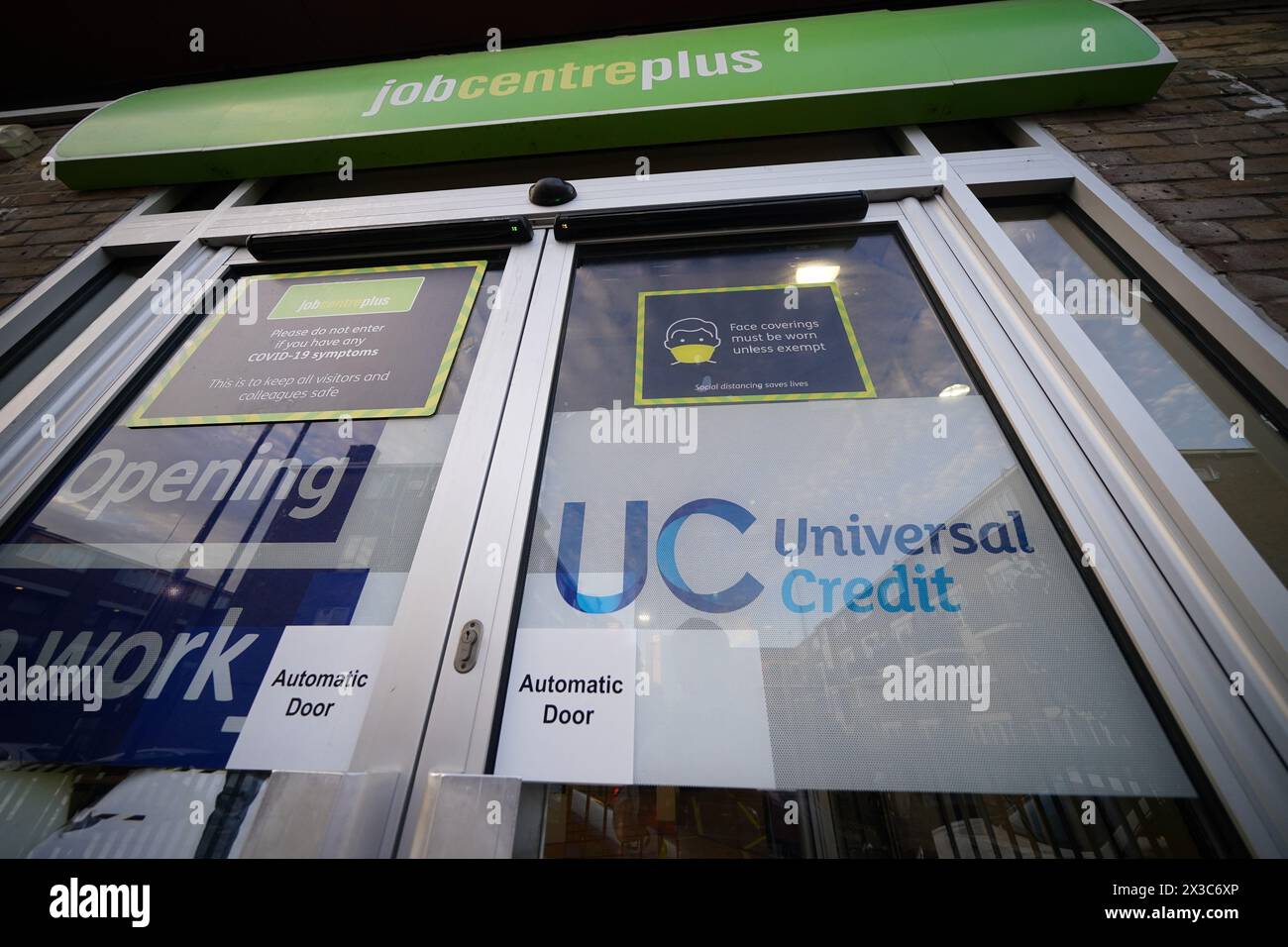 File photo dated 06/10/21 of a Universal Credit sign on the door of a job centre plus in east ...