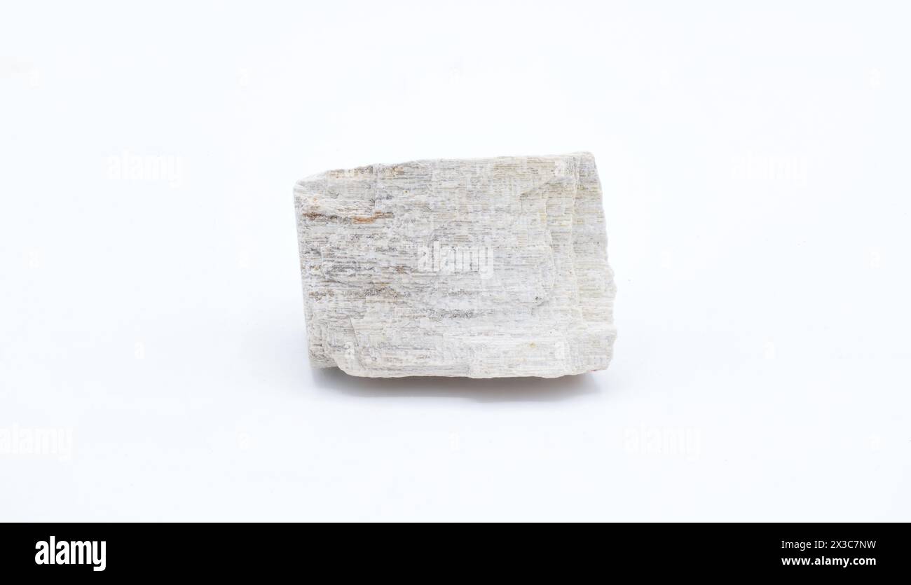Cut out gypsum satin spar mineral rock isolated on white background ...