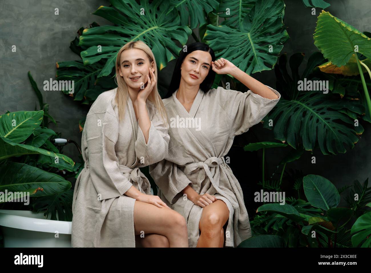 Two women in bathtub hi-res stock photography and images - Alamy