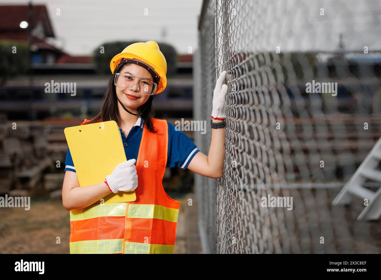 portrait Asian young teen engineer worker standing happy smile outdoor ...
