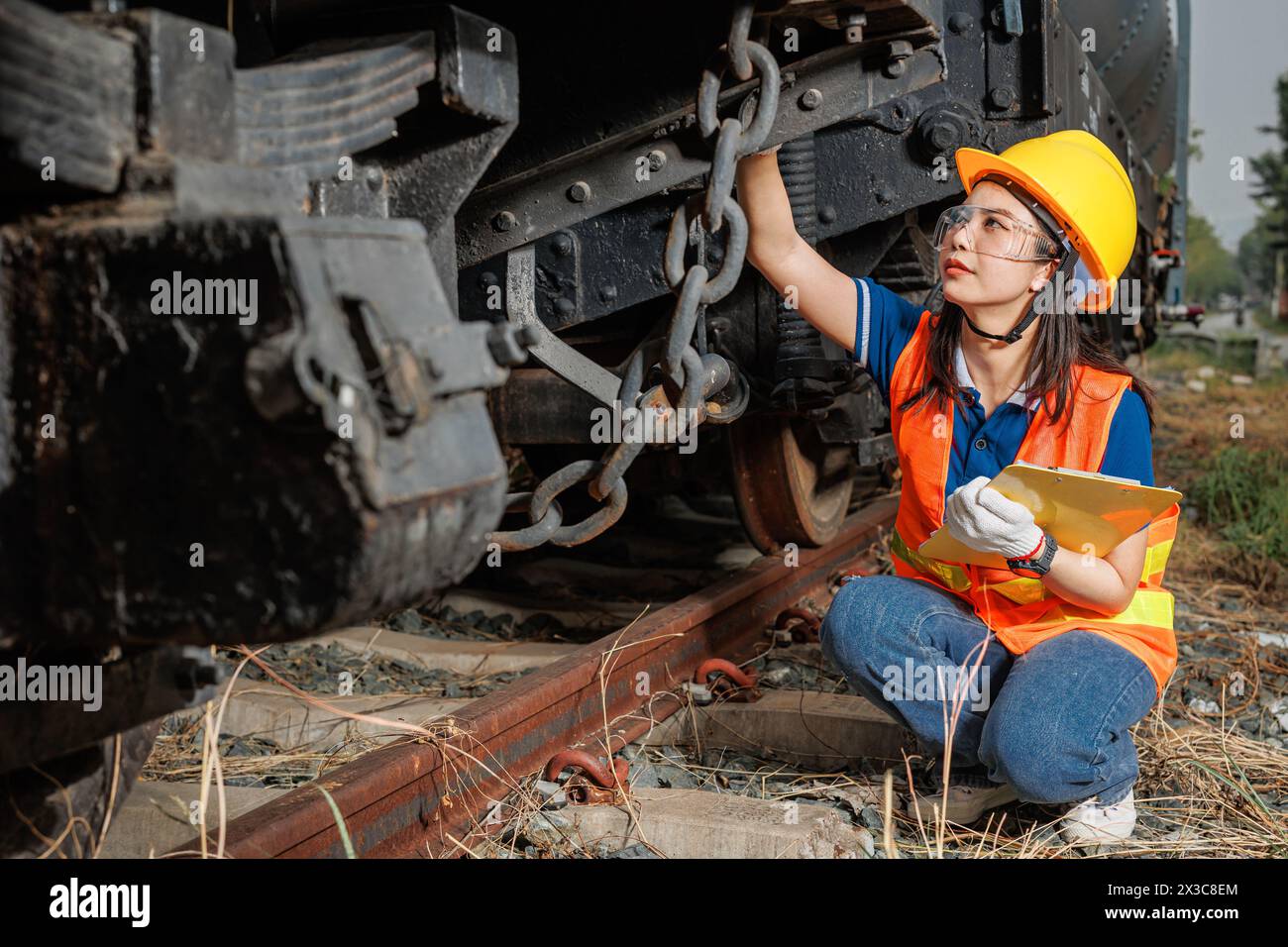 engineer women worker servicing check train. young teen maintenance ...