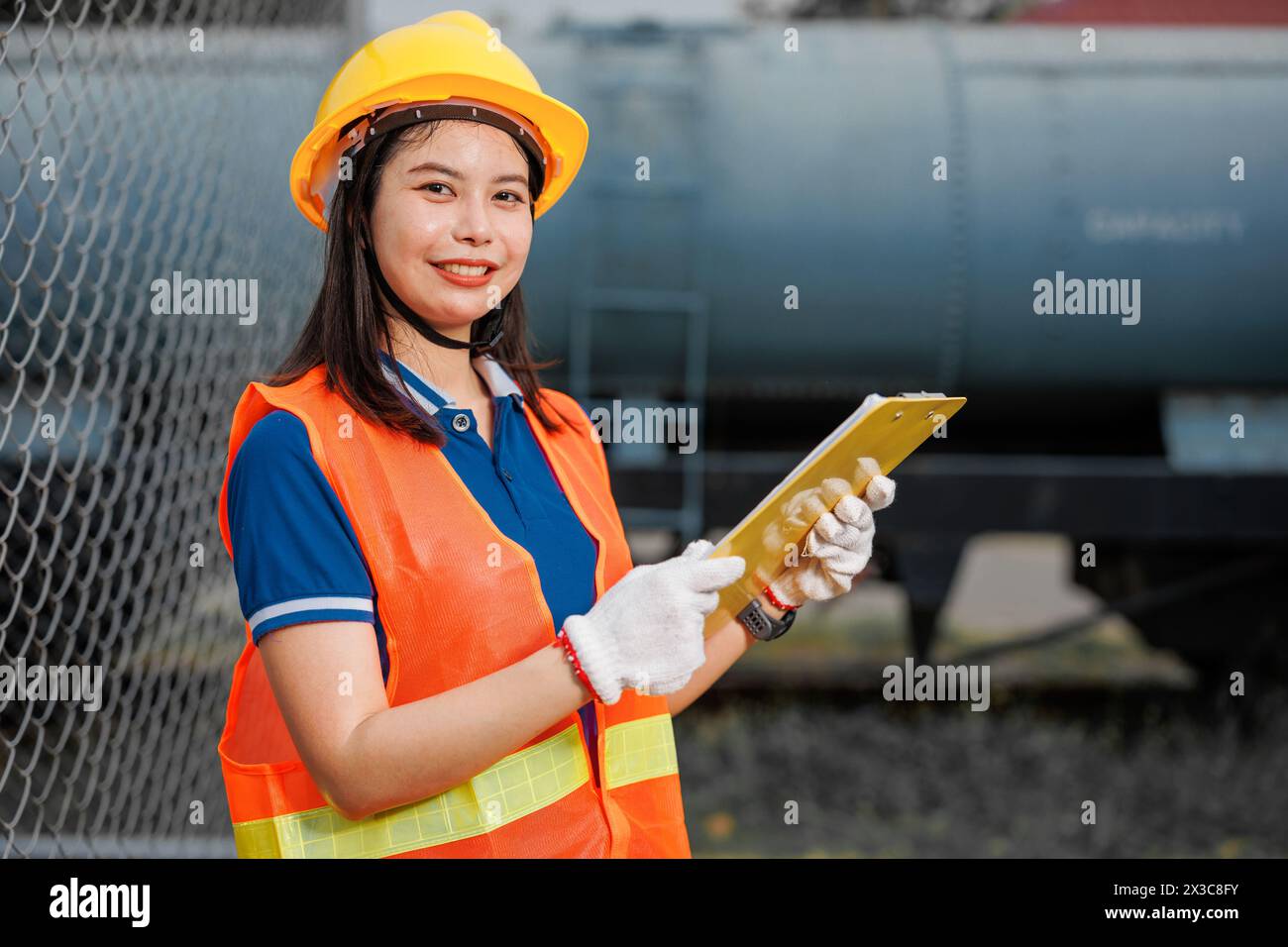 portrait Asian young teen engineer worker standing happy smile outdoor ...