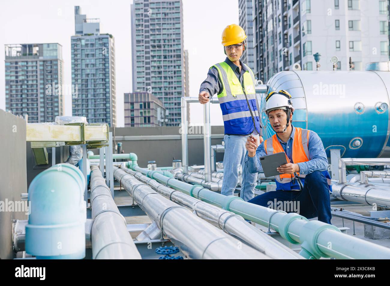 engineer teamwork technician workers service hotel boiler tank hot ...