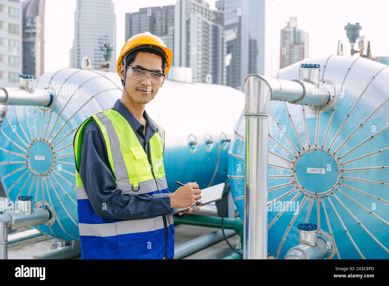 portrait asian male engineer worker work on site service maintenance ...