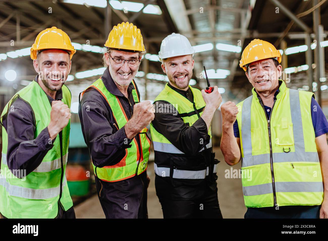 Engineer male team working in heavy industry standing together. group ...