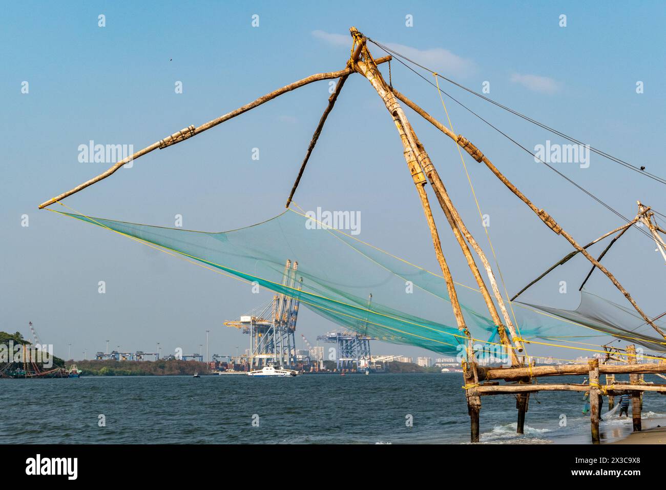 Kerala, INDIA - MARCH 21, 2024: traditional fishing with fishing nets ...