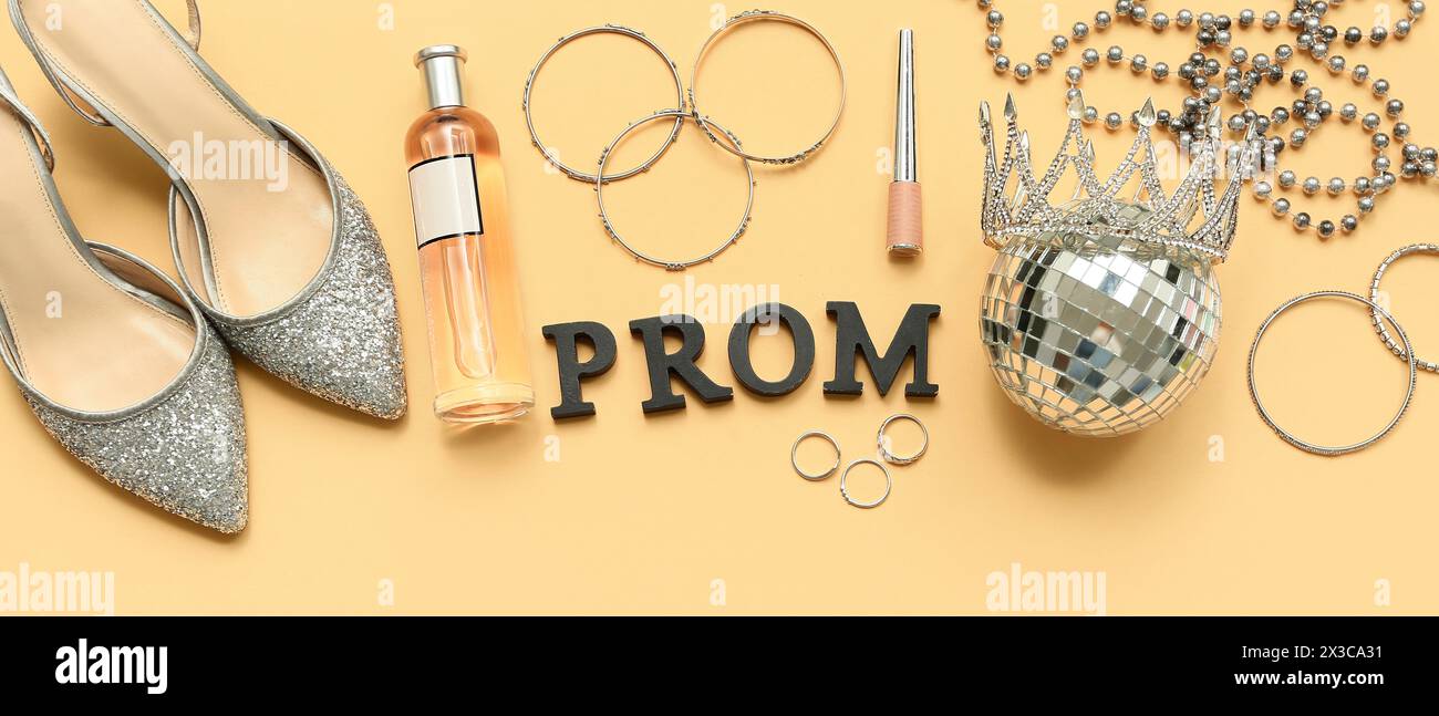 Word PROM with female shoes, disco ball and accessories on beige ...