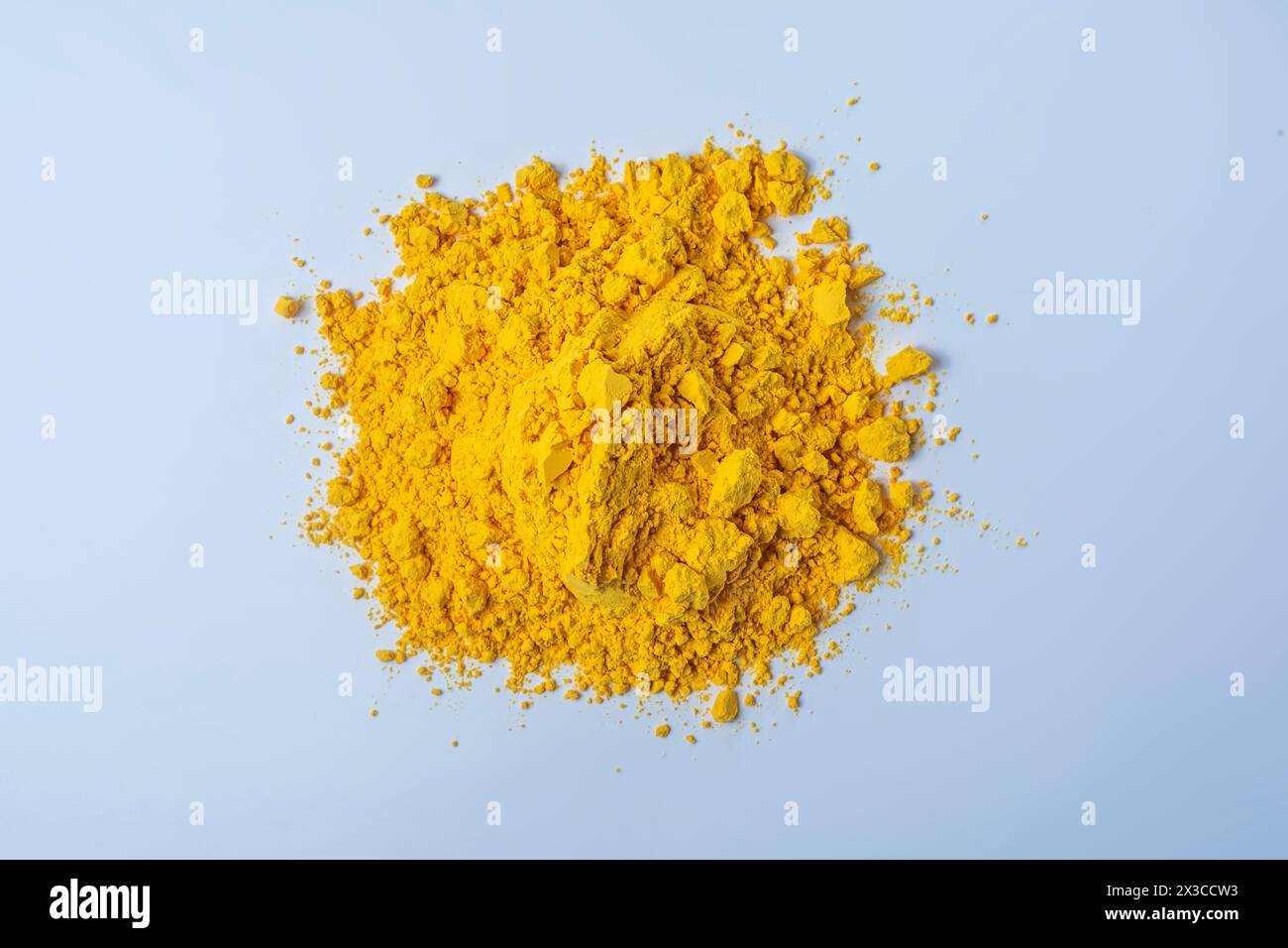 Pile of yellow color holi powder isolated on white background. Holi ...