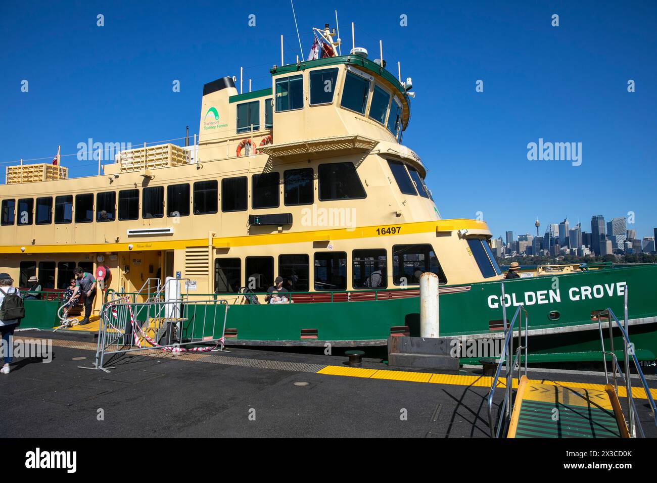 Sydney Harbour ferry the MV Golden Grove arrives at Cremorne Point ...