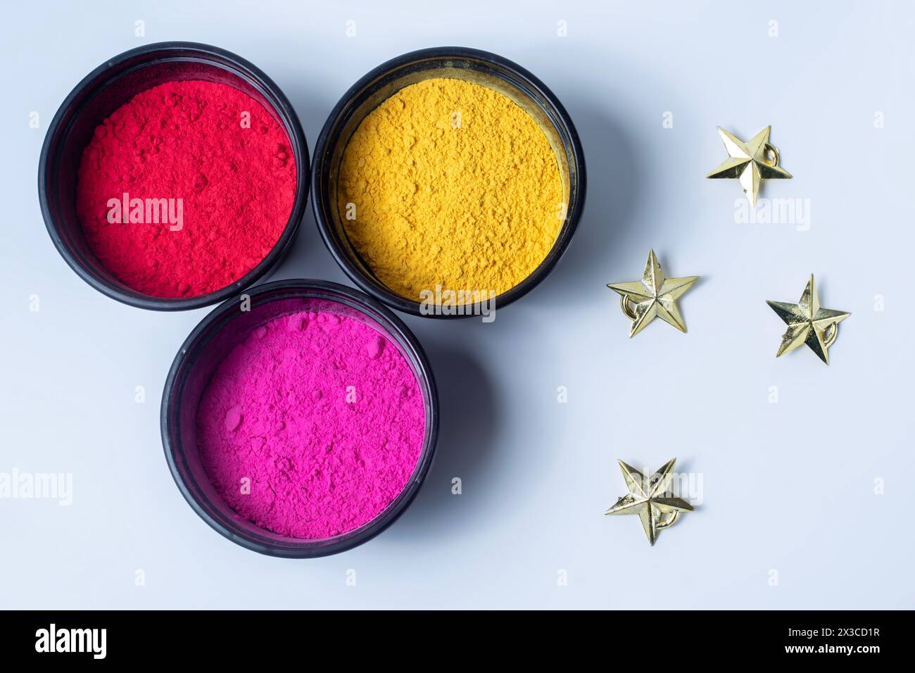 Indian Festival Holi background with colorful powder and golden star ...