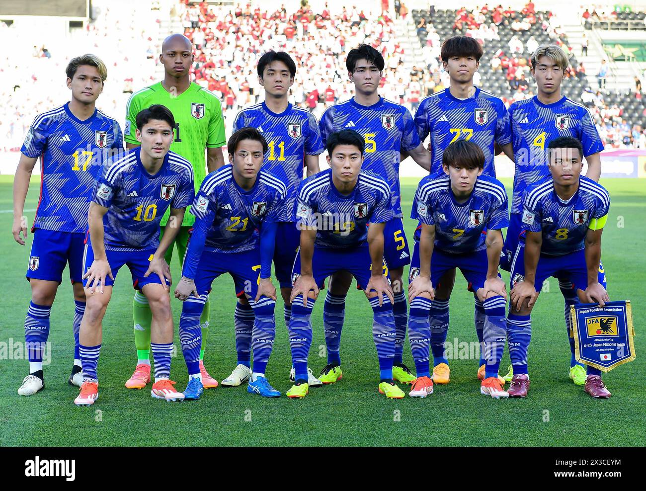 Doha, Qatar. 25th Apr, 2024. Starting players of Japan line up prior to the quarter-final match ...
